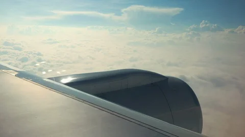 Left wing of engine and wing of flying p... | Stock Video | Pond5