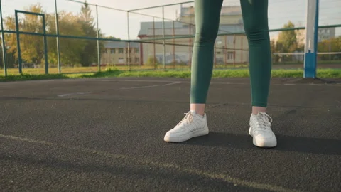 Leg View of Lady Bouncing Volleyball Out... | Stock Video | Pond5