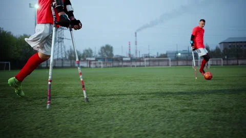 Legs of disabled football plaer with bal... | Stock Video | Pond5
