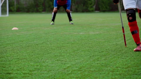 Legs of disabled football plaer with bal... | Stock Video | Pond5