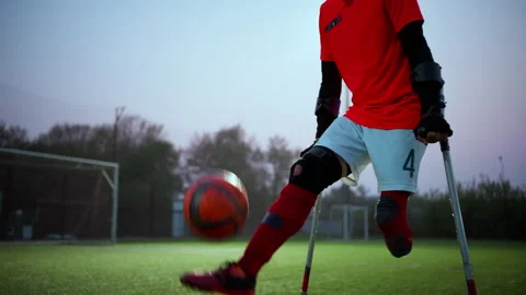 Legs of disabled football plaer with bal... | Stock Video | Pond5