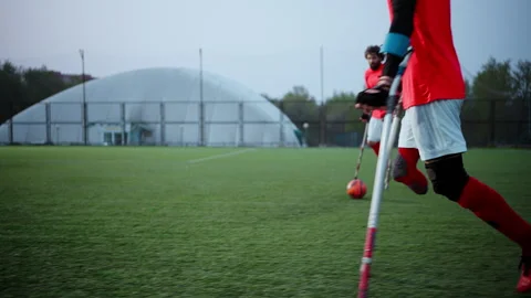 Legs of disabled football plaer with bal... | Stock Video | Pond5