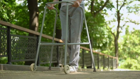 Legs of patient slowly moving with help ... | Stock Video | Pond5