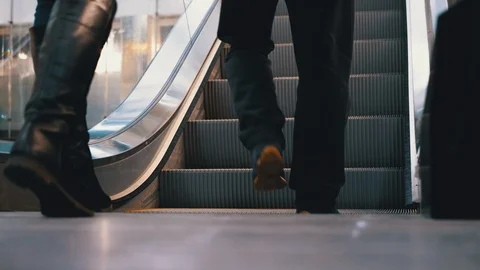 Legs of People Moving on an Escalator Li... | Stock Video | Pond5