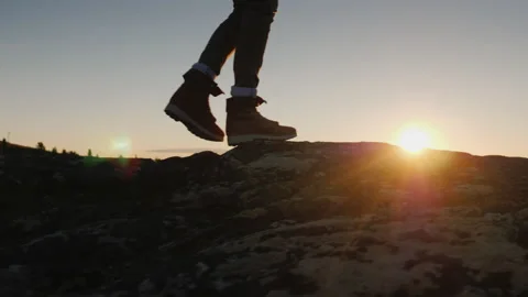 The legs walk on the edge of the earth o... | Stock Video | Pond5
