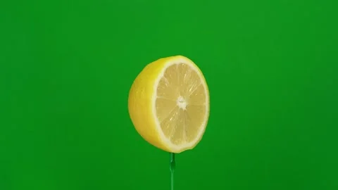 lemon slice spin on green screen | Stock Video | Pond5