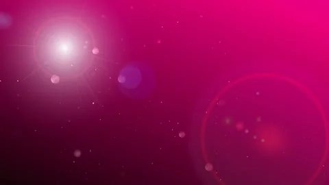 Lens flare and particles on dark pink gr... | Stock Video | Pond5
