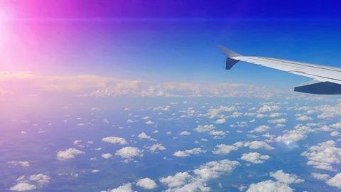 Lens Flare, View of Airplane Jet Wing Sk... | Stock Video | Pond5