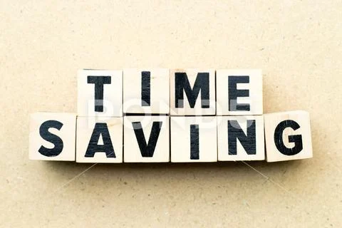 Letter block in word time saving on wood background ~ Premium Photo ...