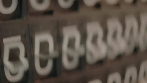Letters and numbers flip on a split flap... | Stock Video | Pond5