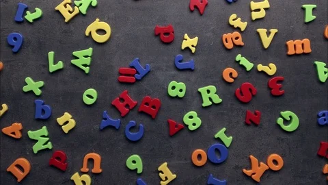 Letters moving on chalkboard background | Stock Video | Pond5