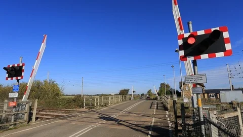 Level Crossing with Warning lights, LNER... | Stock Video | Pond5