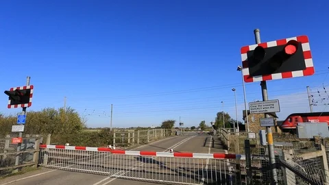 Level Crossing with Warning lights, LNER... | Stock Video | Pond5