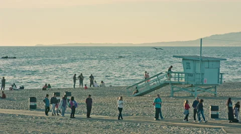 lifeguard hut tower beach tourists walki... | Stock Video | Pond5