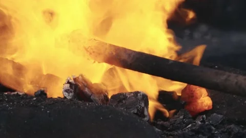 Lifting and checking the molten iron bar... | Stock Video | Pond5