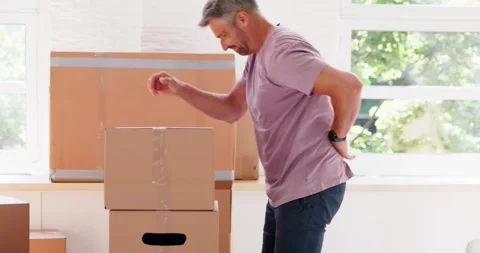 Lifting Heavy Box With Back Pain | Stock Video | Pond5