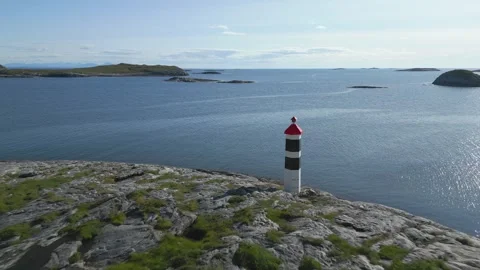 Light beacon with blue ocean as a backgr... | Stock Video | Pond5