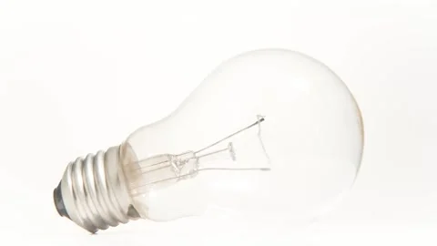 Light bulb, isolated, rotating on white ... | Stock Video | Pond5
