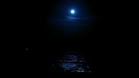 The light of the full moon is reflected ... | Stock Video | Pond5