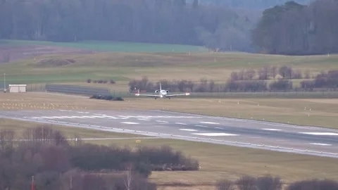 Light private jet landing at generic air... | Stock Video | Pond5