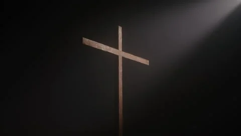 Light Shining Down On Crucifix In the Da... | Stock Video | Pond5