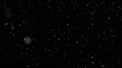 Light soft snow falling isolated on bla... | Stock Video | Pond5