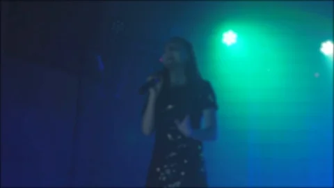 light two singers spotlight concert retr... | Stock Video | Pond5