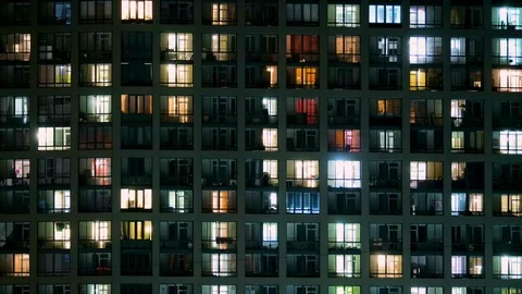 Light in windows of multi-storey buildin... | Stock Video | Pond5