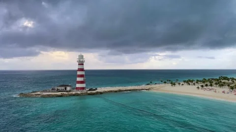 The lighthouse and beach on MSC Cruise L... | Stock Video | Pond5