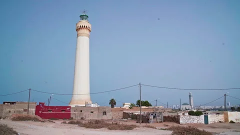 Lighthouse and slum village in Casablanc... | Stock Video | Pond5