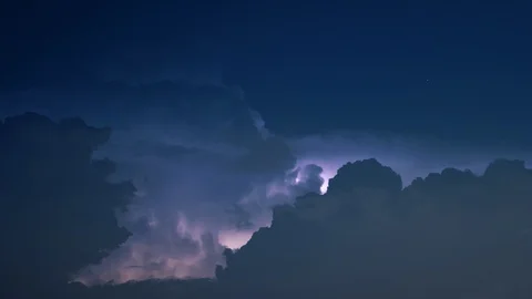 Lightning flashes as stars fall into bil... | Stock Video | Pond5