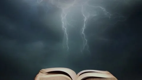 Lightning storm over open Bible looping ... | Stock Video | Pond5