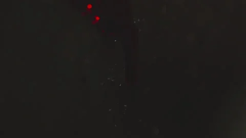 Lights Blinking Behind The Red Blood Dri... | Stock Video | Pond5