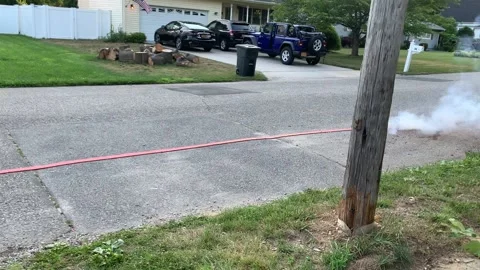 Line of Firecrackers Meets in the Middle... | Stock Video | Pond5