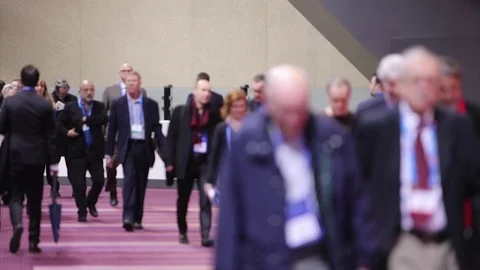 A line of people walking down a corridor... | Stock Video | Pond5