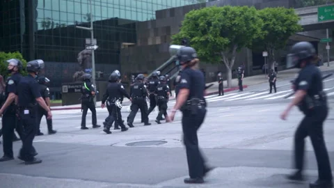 Lines of riot police block off the stree... | Stock Video | Pond5