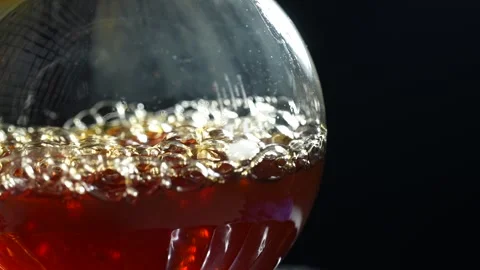 Liquid boils in a laboratory flask. Do d... | Stock Video | Pond5