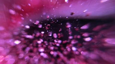 Liquid Glitter - Pink Shards Sinking | Stock Video | Pond5