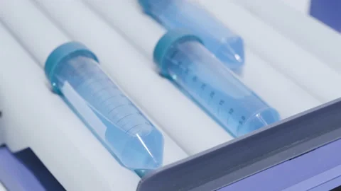 Liquid mixing in glass beaker for scienc... | Stock Video | Pond5