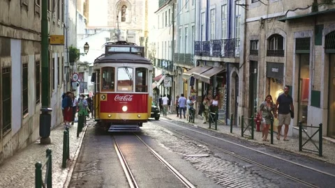 Lisbon tram 28 trolley streetcar on main... | Stock Video | Pond5