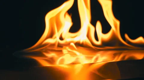 A lit match ignites gasoline. Blue Wave ... | Stock Video | Pond5