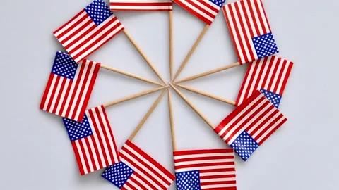 Little American flag rotating on white b... | Stock Video | Pond5