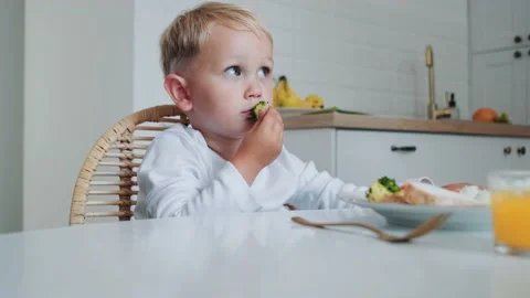 Boy Eating Broccoli Stock Videos – Royalty-Free HD & 4K Videos