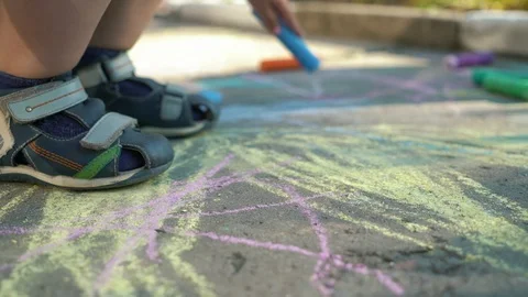 Little baby sitting in a shadow in sunny... | Stock Video | Pond5