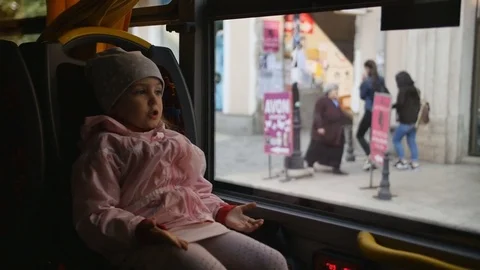 Little Blonde Girl in a pink jacket, Kid... | Stock Video | Pond5