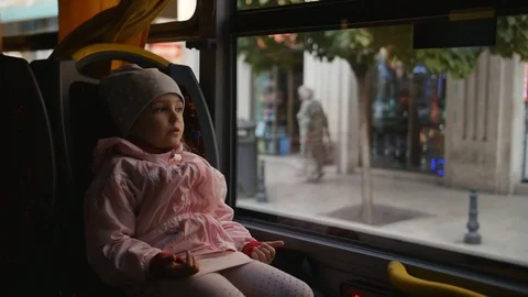 Little Blonde Girl in a pink jacket, Kid... | Stock Video | Pond5