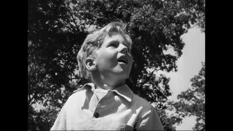 Little Boy In Cemetery In Front Of Histo... | Stock Video | Pond5