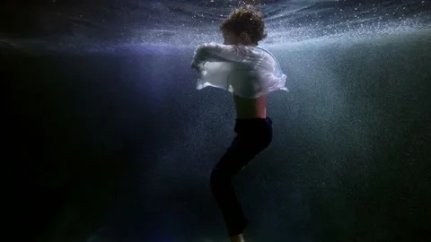 little boy is floundering underwater, fl... | Stock Video | Pond5