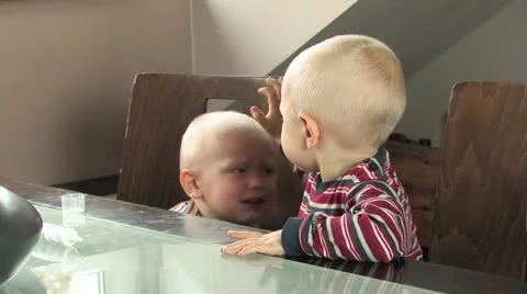 little boy hitting his brother | Stock Video | Pond5