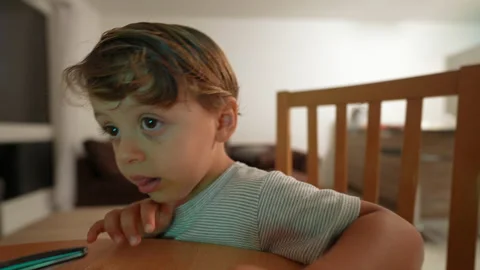 Little boy hypnotized by screen kid watc... | Stock Video | Pond5